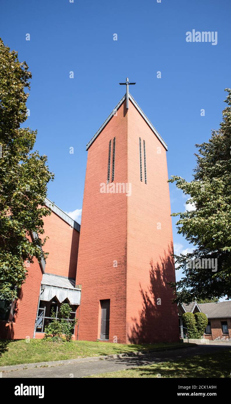 Low angle shot of a Catholic church tower with the Cross on the tops of ...