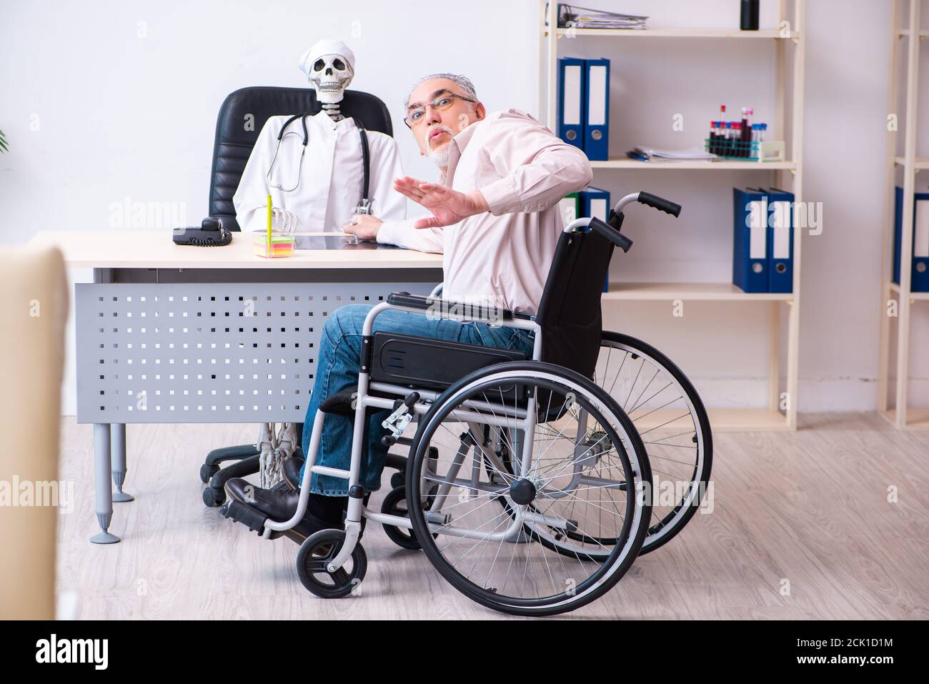 Medical skeleton in wheelchair hi-res stock photography and images - Alamy