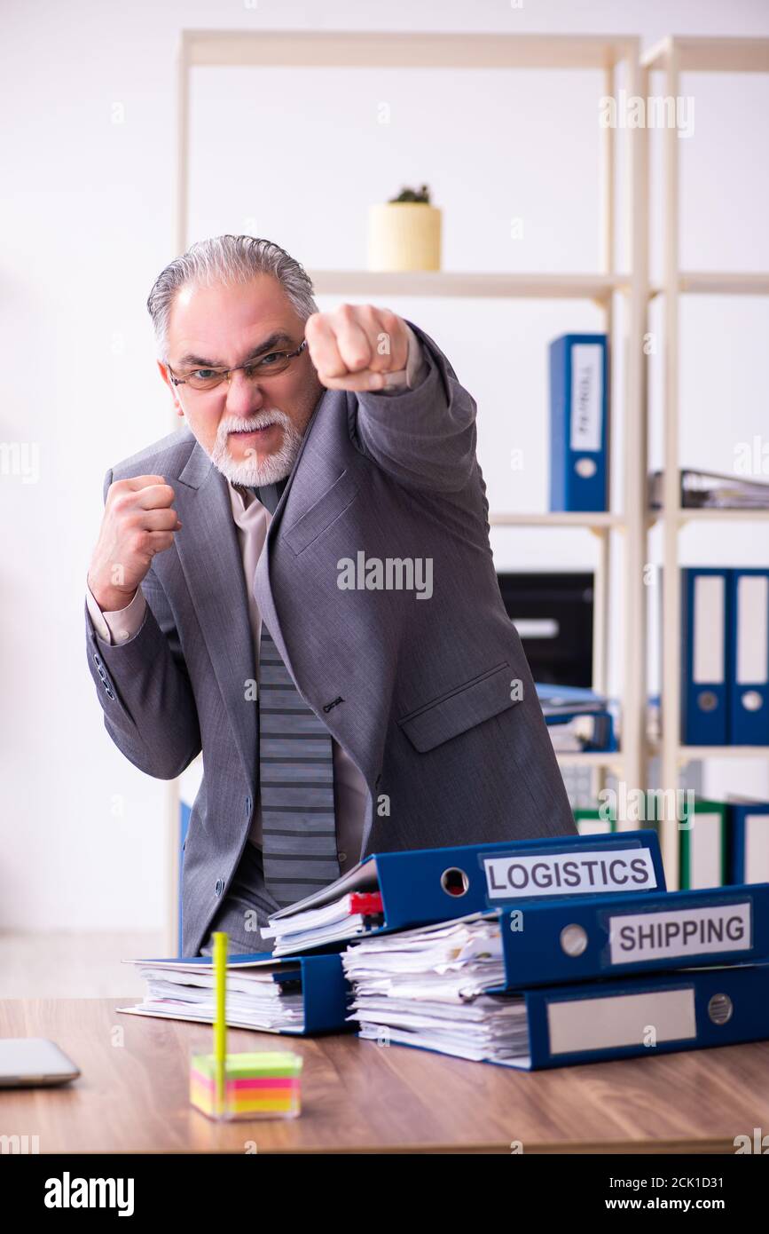 Businessman angry and furious at his workplace Stock Photo - Alamy