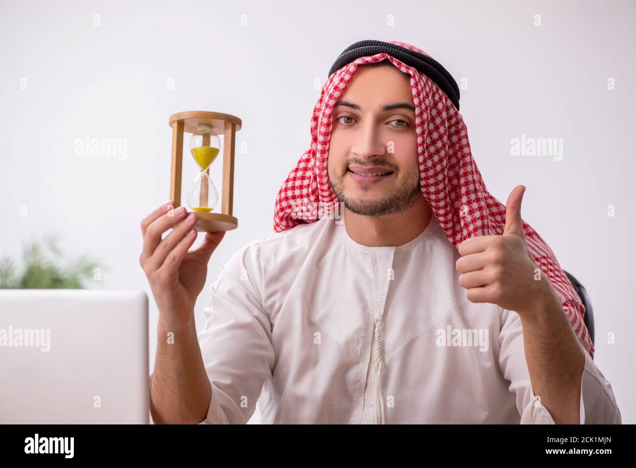 Male arab employee working in the office Stock Photo - Alamy