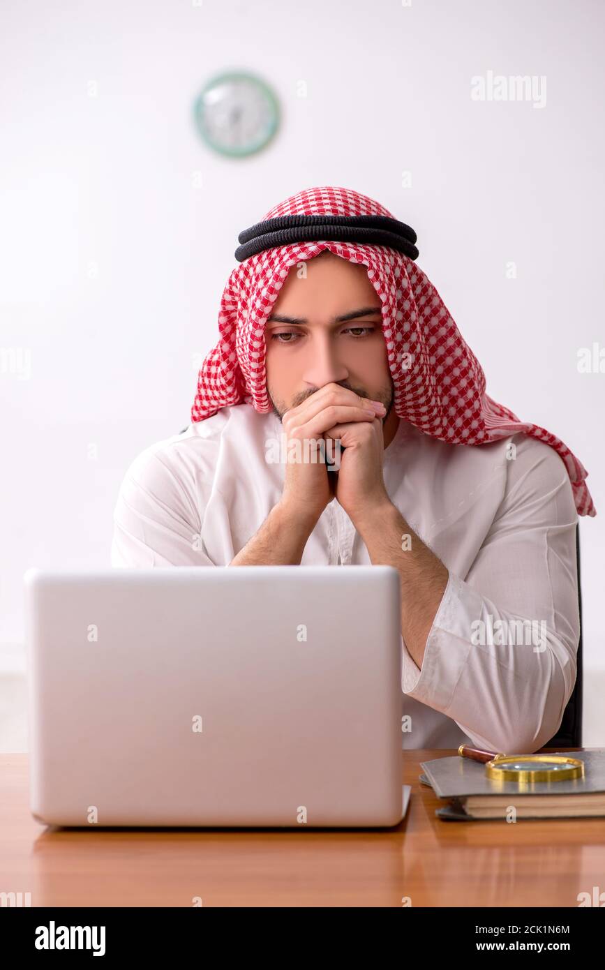 Male arab employee working in the office Stock Photo - Alamy
