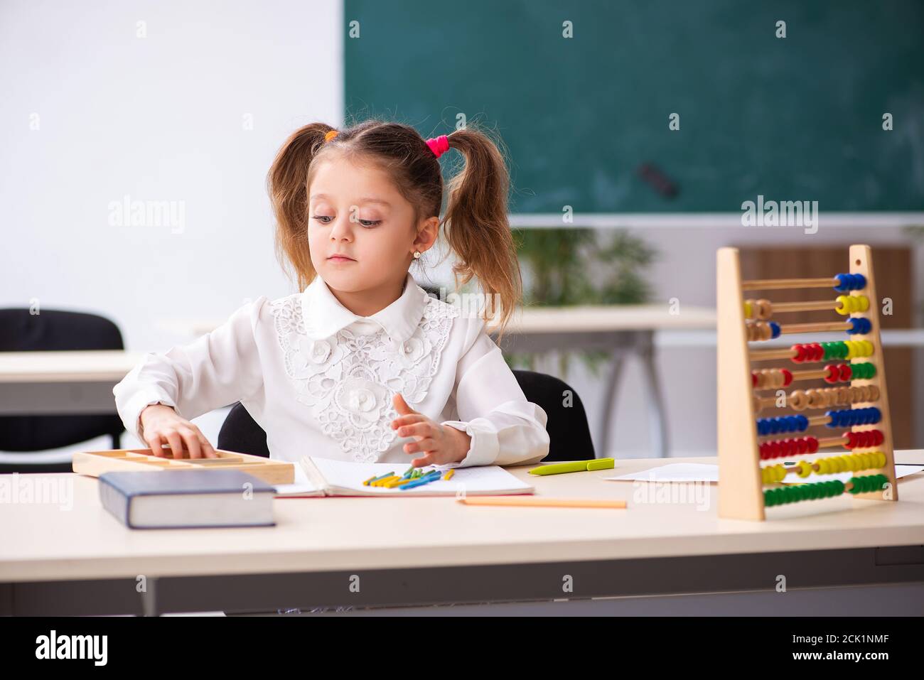 Small girl in the early development concept Stock Photo - Alamy