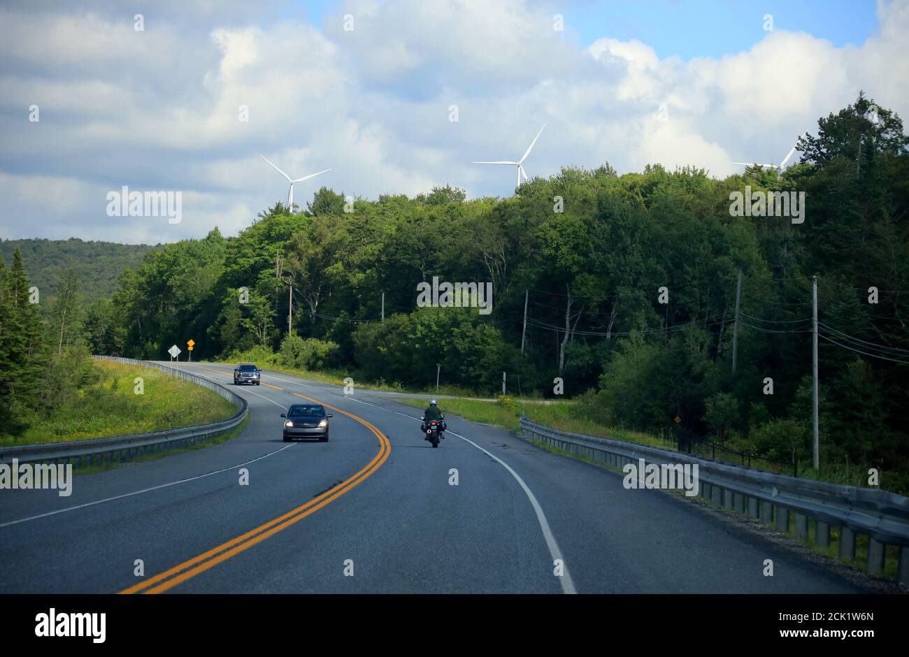 A motorcycle and cars on Vermont Route 100 near Wilmington.Vermont.USA ...