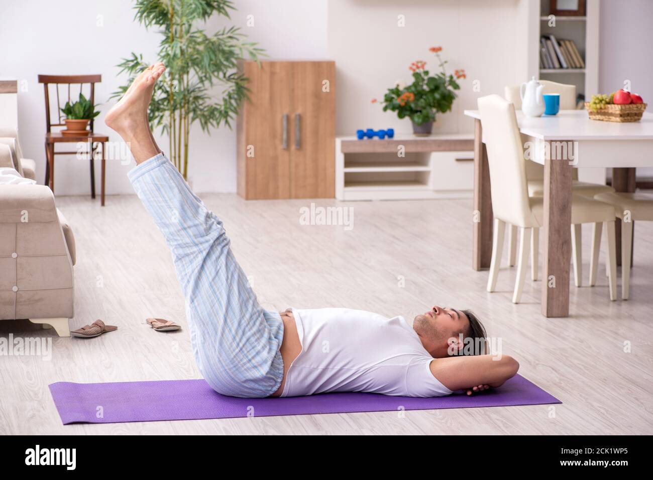Man starting day with morning exercises Stock Photo - Alamy