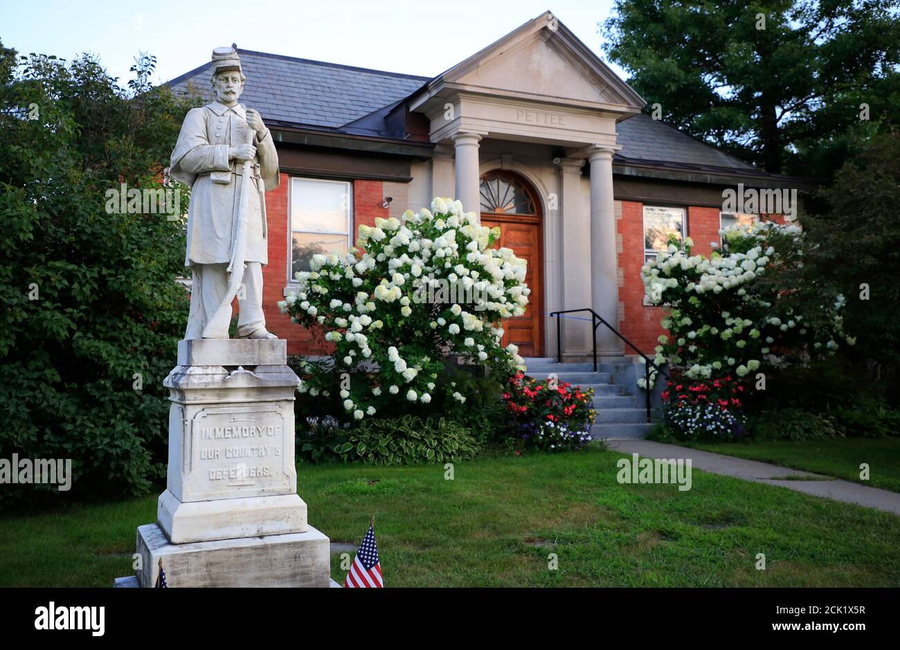 The Civil War memorial of a Union soldier statue in front of Pettee ...