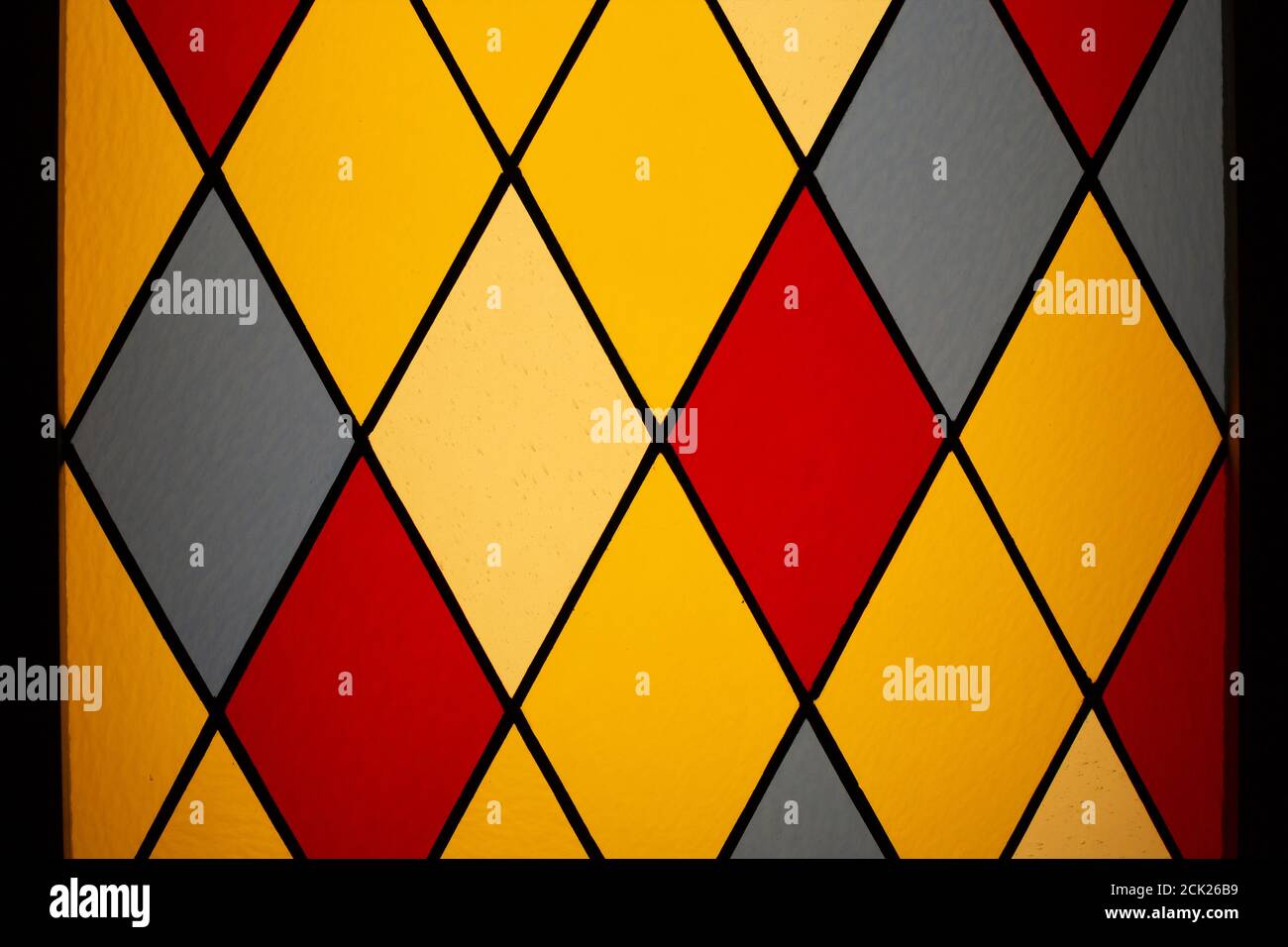 stained glass window of colored glass, rhombus pattern Stock Photo - Alamy