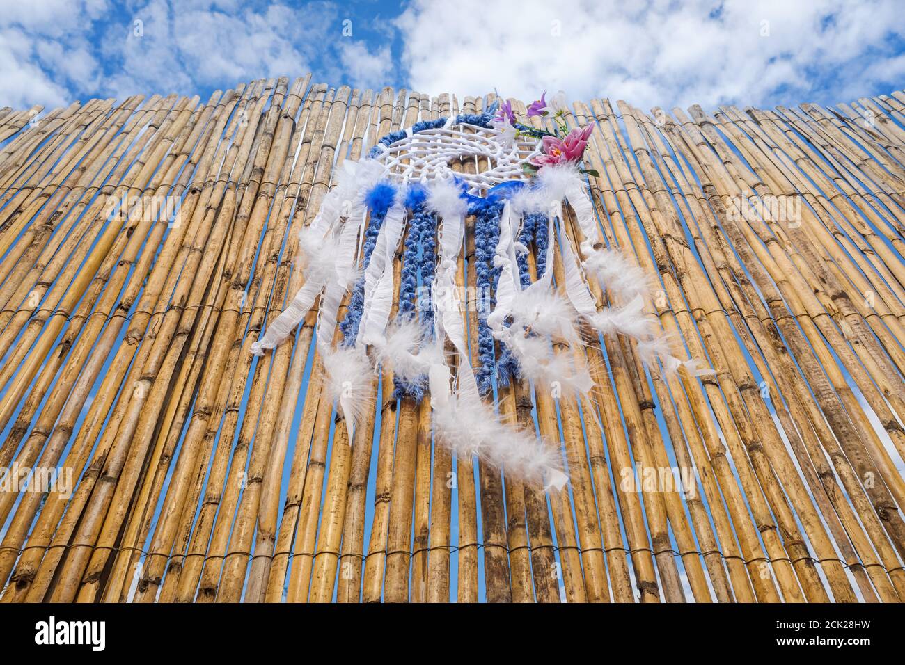 Artisan dreamcatcher in blue tones, handmade willow hoop, hanging from ...