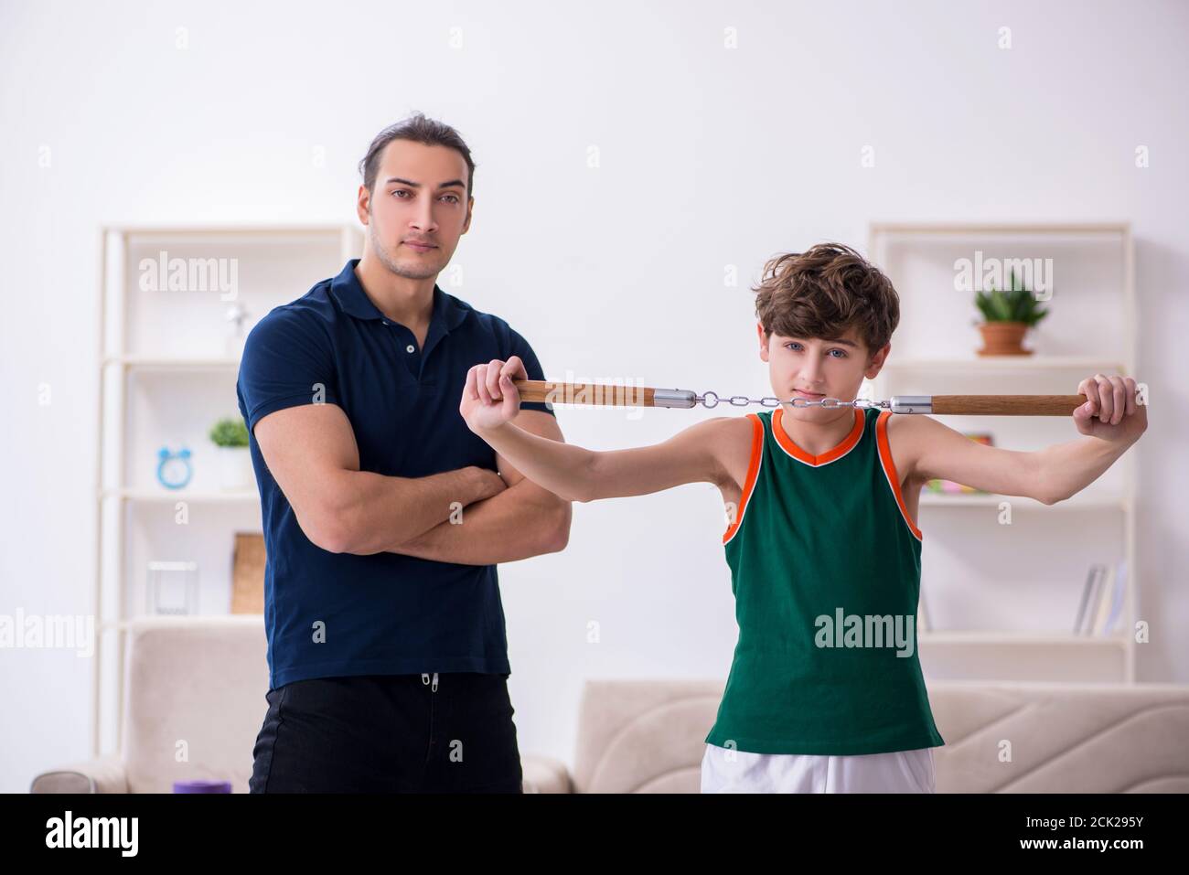 Man boy doing sport exercises hi-res stock photography and images - Alamy