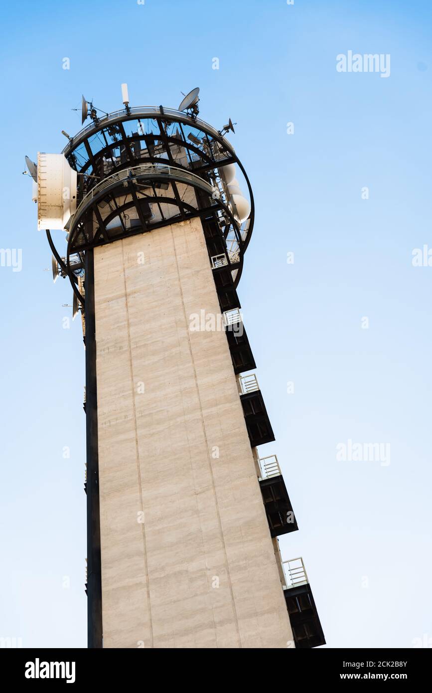 Large telecommunications tower full of radio and television broadcast ...