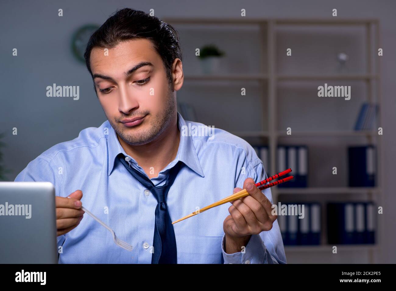 Work at night eat at desk hi-res stock photography and images - Alamy