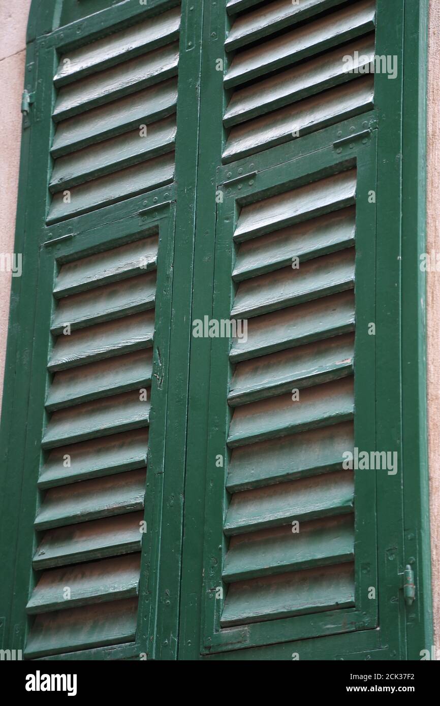 Low angle shot of an old building window grill Stock Photo - Alamy