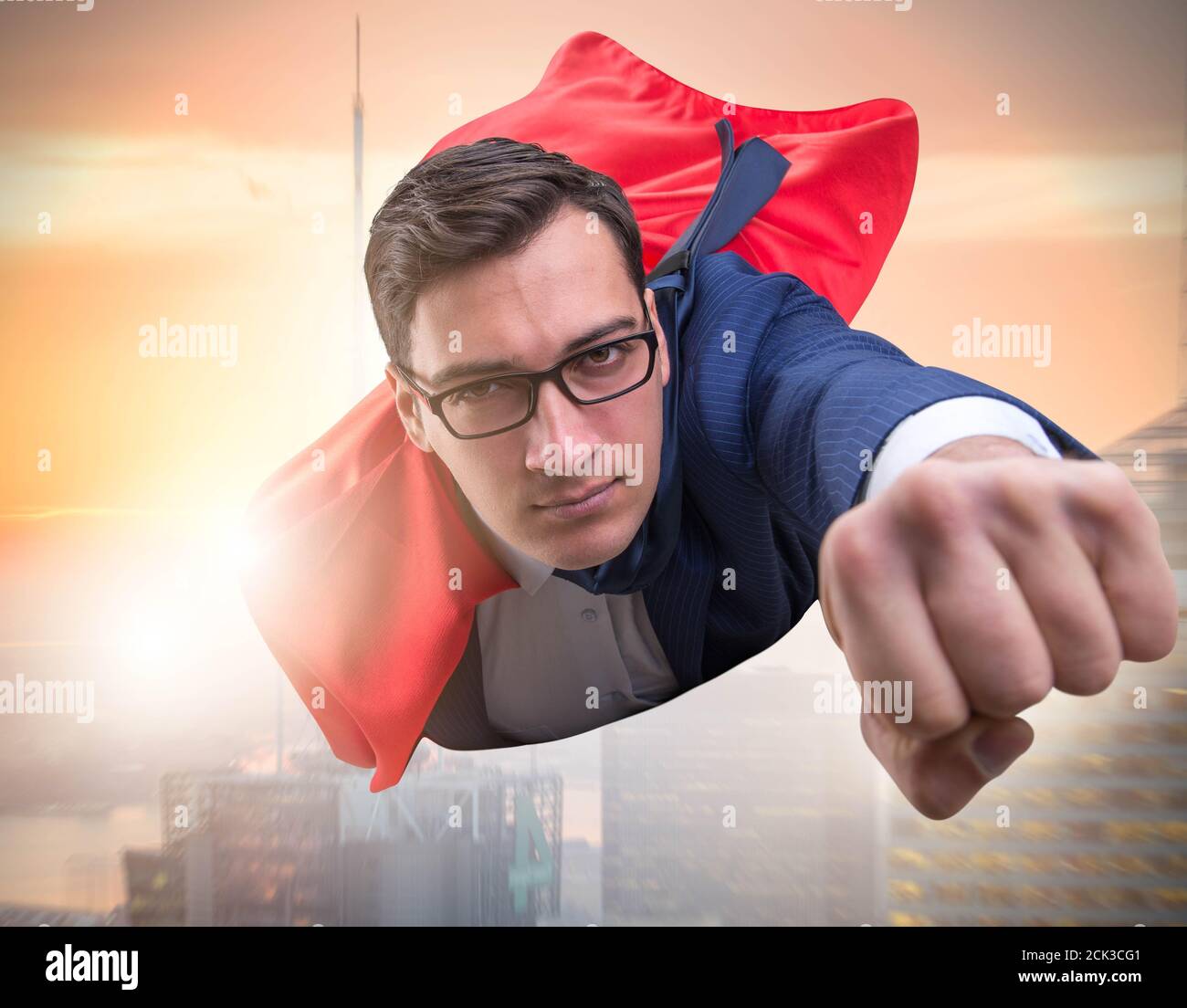The flying super hero over the city Stock Photo - Alamy