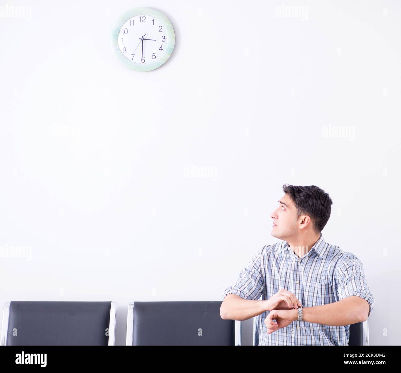 The man nervously impatiently waiting in the lobby Stock Photo - Alamy