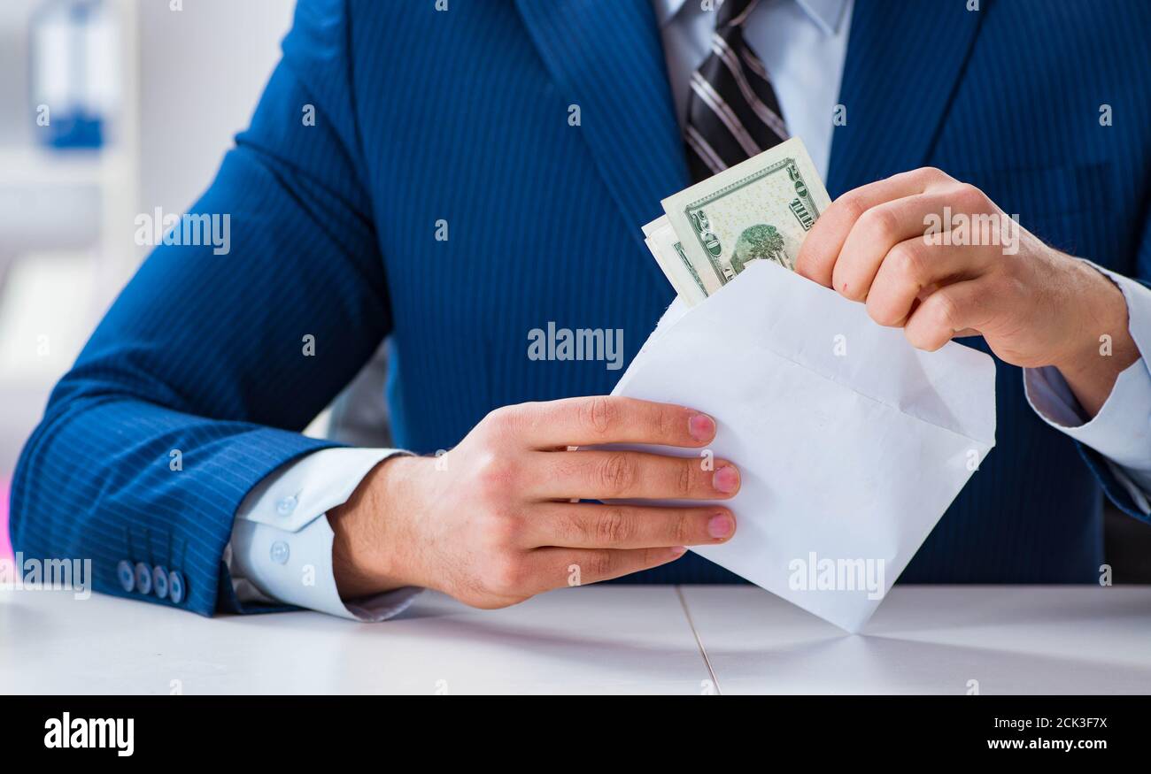 The businessman receiving his salary and bonus Stock Photo - Alamy