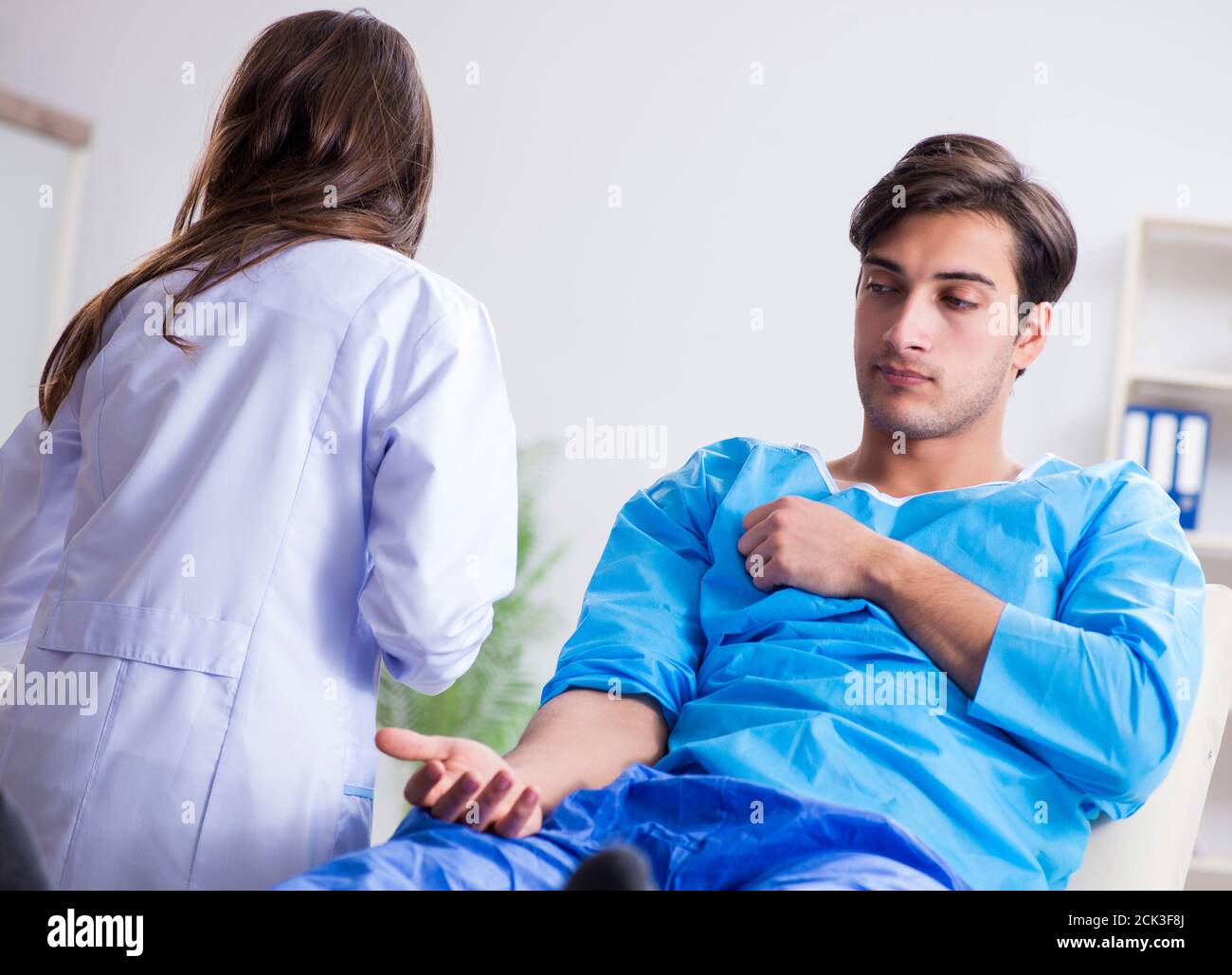 The scared patient man getting ready for flu shot Stock Photo - Alamy