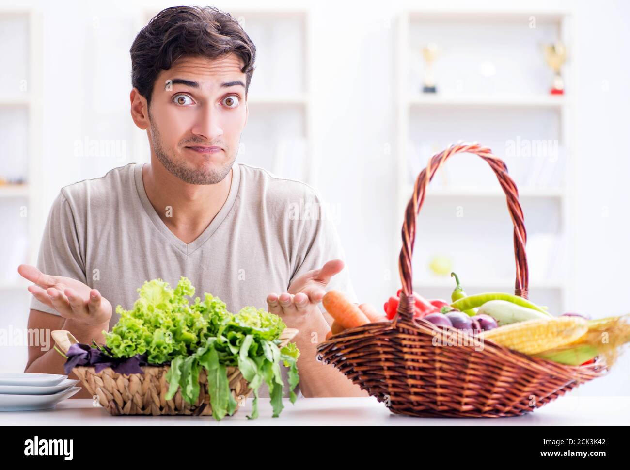 The young man in healthy eating and dieting concept Stock Photo - Alamy