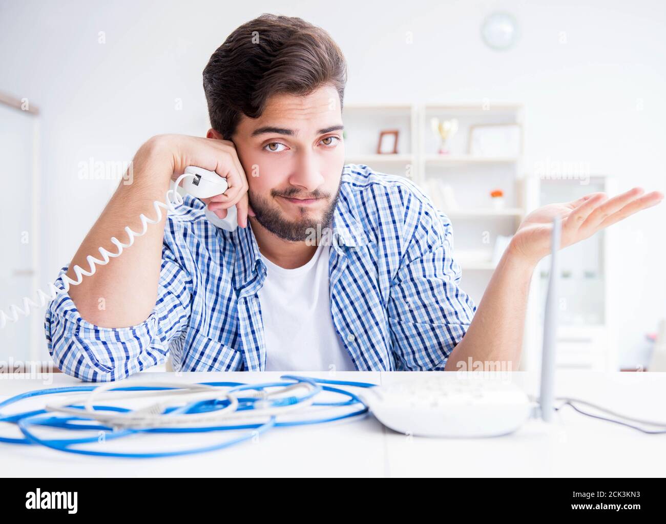 The frustrated young man due to weak internet reception Stock Photo - Alamy