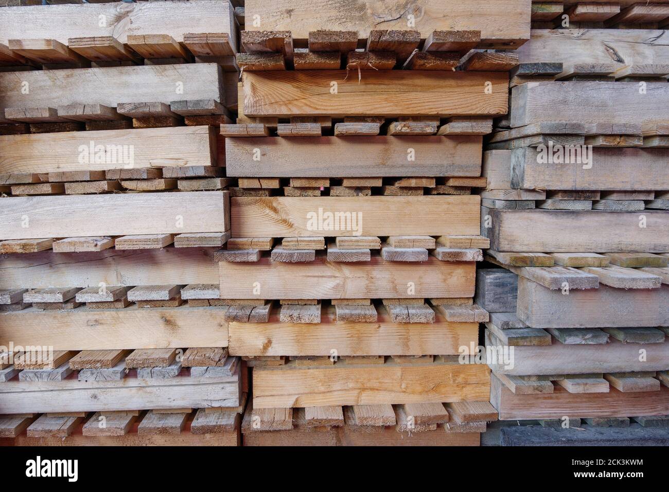 Background and Stack of Timbers or wooden palettes Stock Photo - Alamy