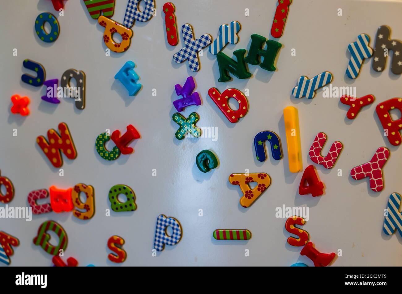 Colorful English letters on white background Stock Photo - Alamy
