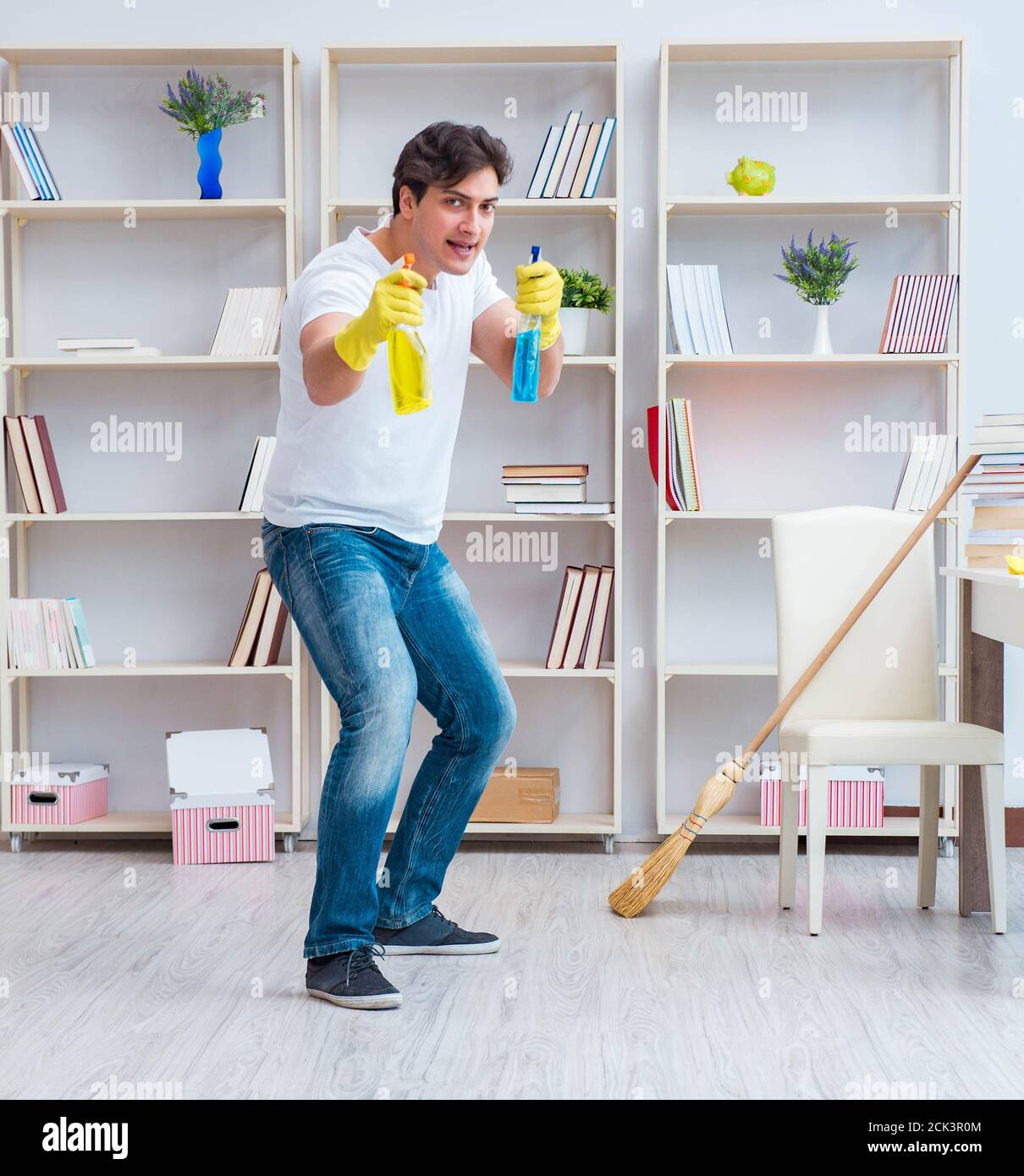 The man doing cleaning at home Stock Photo - Alamy