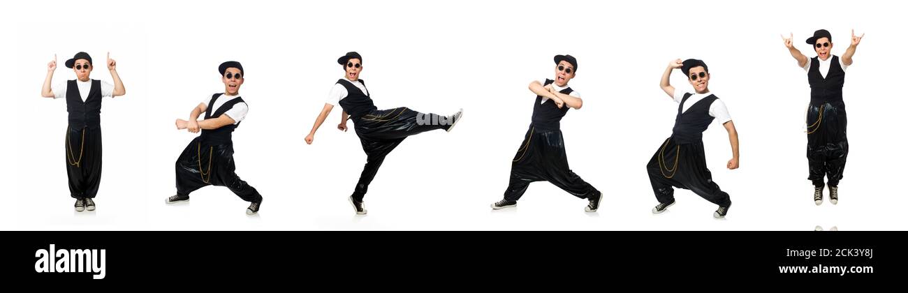 The funny young man dancing isolated on white Stock Photo - Alamy