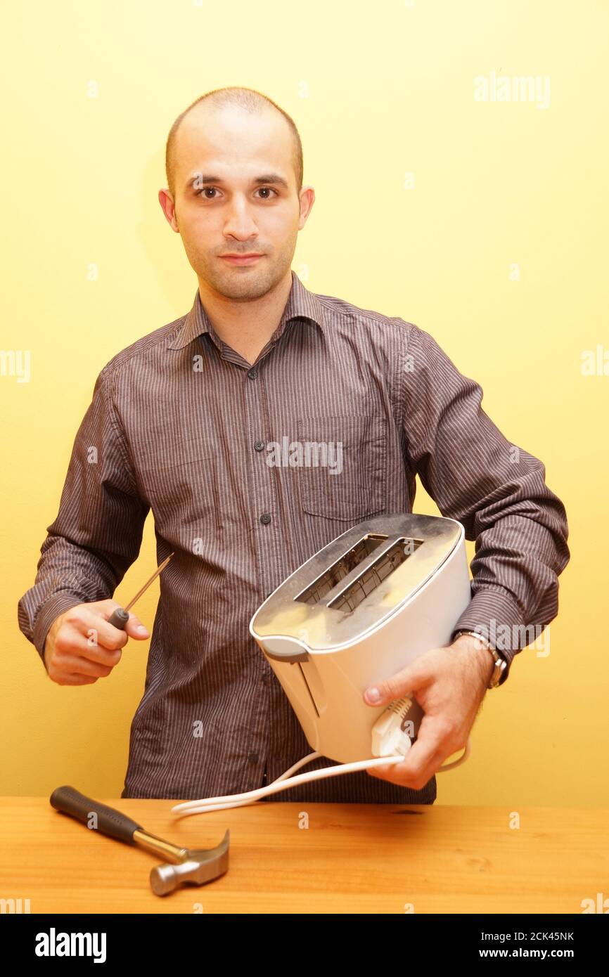 Broken toaster hi-res stock photography and images - Alamy