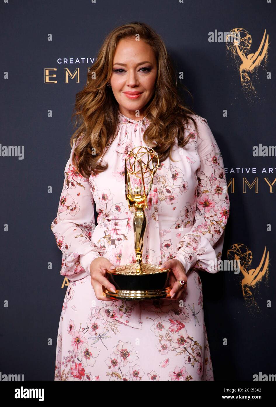 Leah Remini holds her Emmy Award for Outstanding Informational Series ...