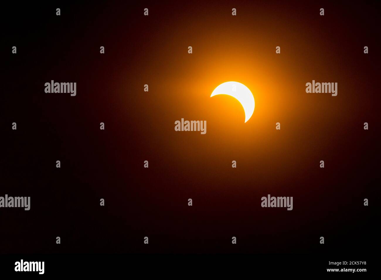 The sun's corona envelops the moon in this near total solar eclipse viewed from Oregon, USA ...