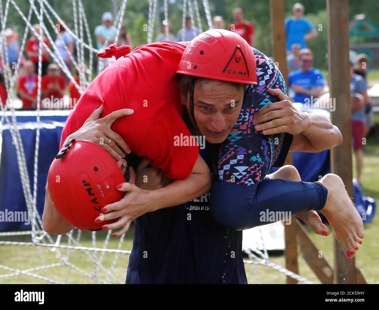 Wife carrying competition hi-res stock photography and images - Alamy