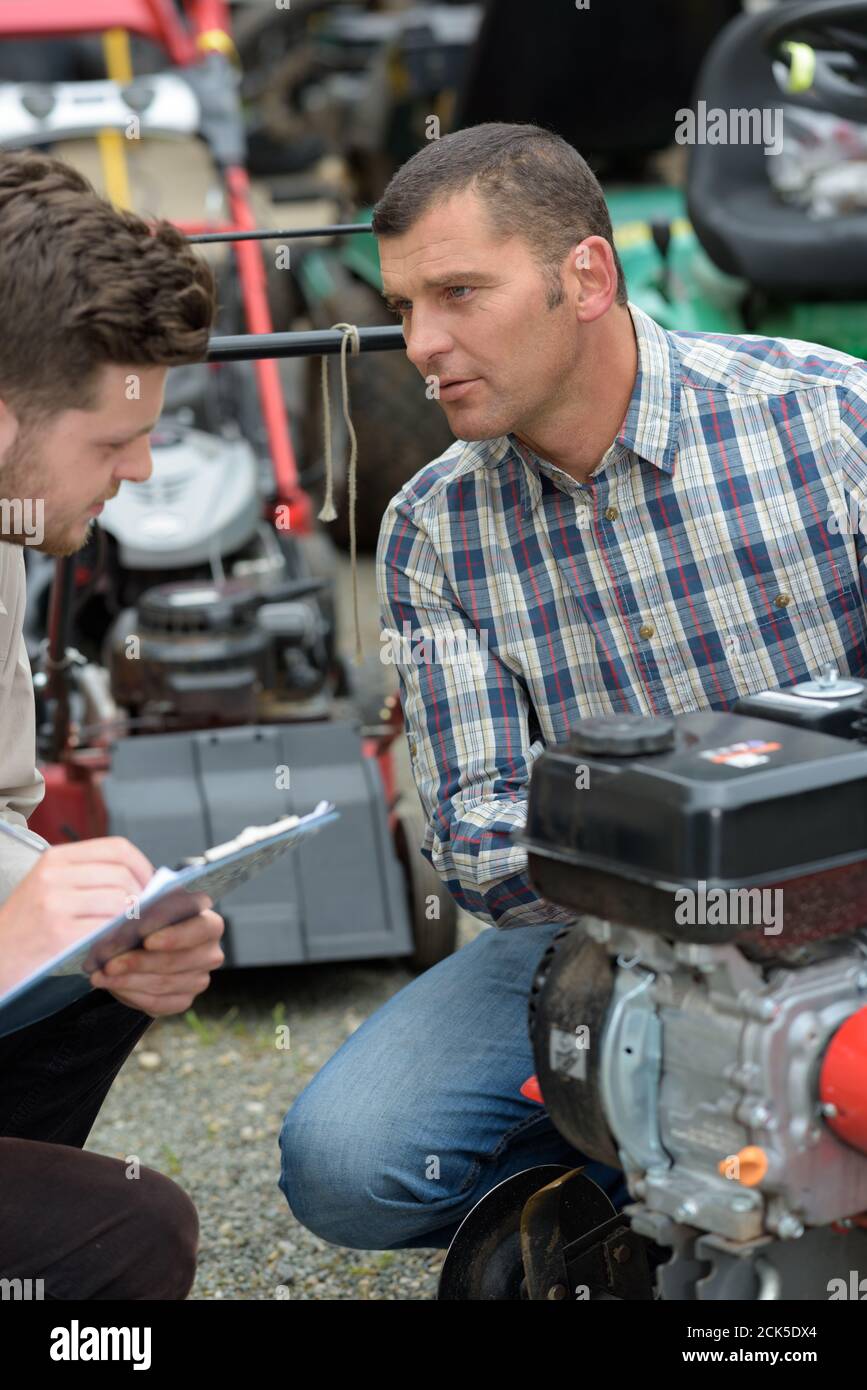 portrait of small engine mechanic apprentice Stock Photo - Alamy