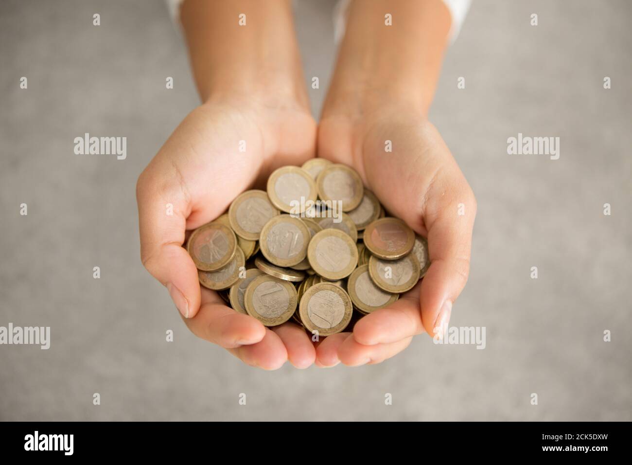 hands saving for the future Stock Photo - Alamy