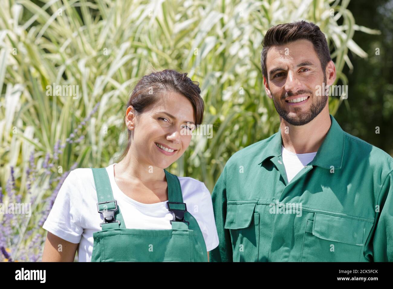 a woman and a man gardeners Stock Photo - Alamy