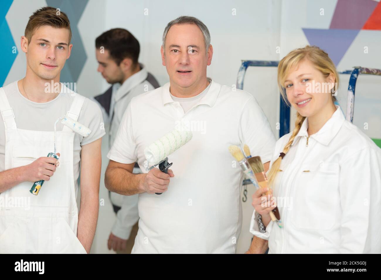 portrait of three painter decorators Stock Photo - Alamy