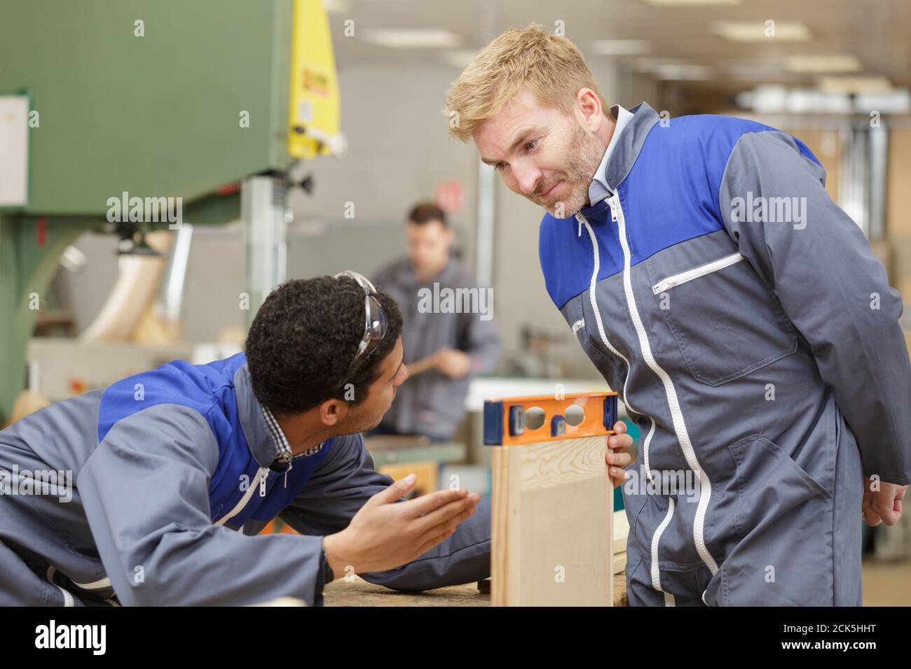 Two men constructing hi-res stock photography and images - Alamy