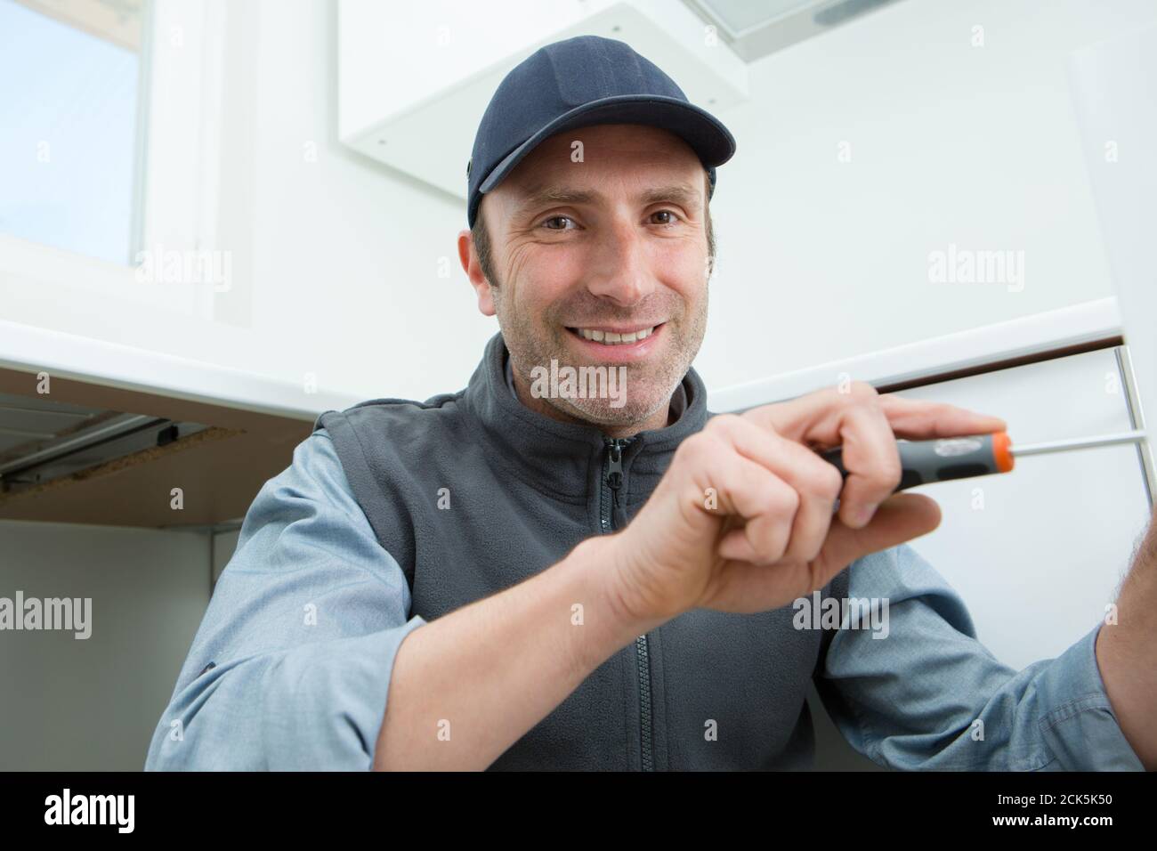 happy man working with tools Stock Photo - Alamy
