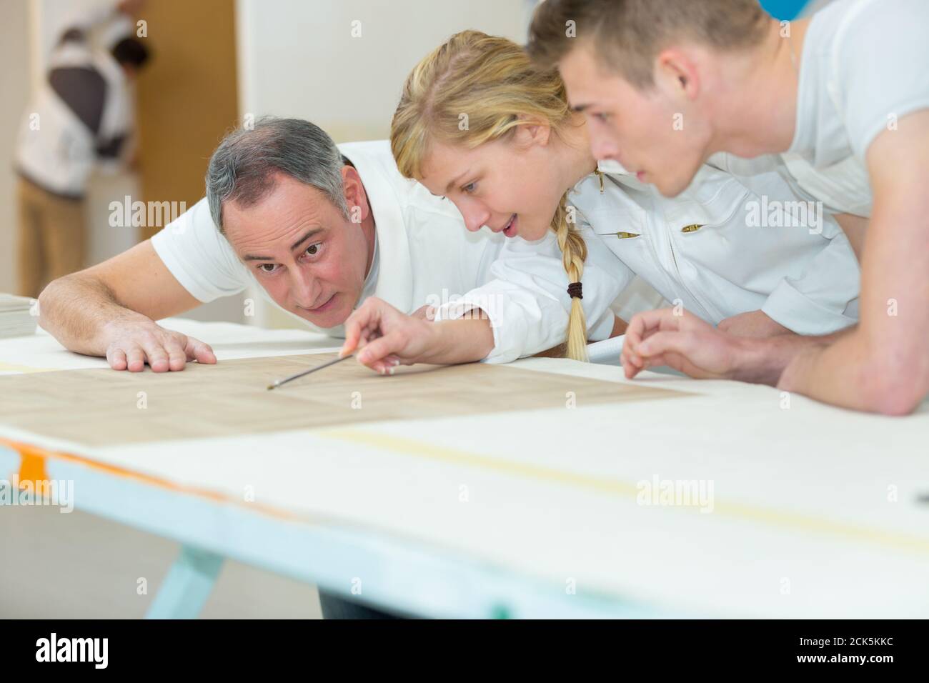 decorating team painting a room Stock Photo - Alamy