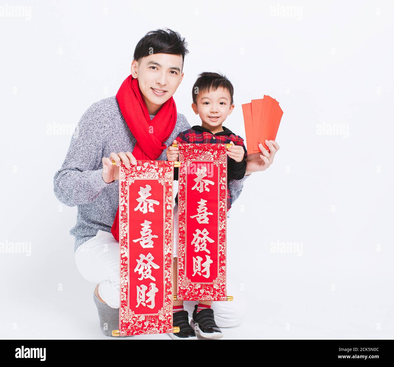 Happy asian father and son showing Red Envelopes and Celebrating new ...