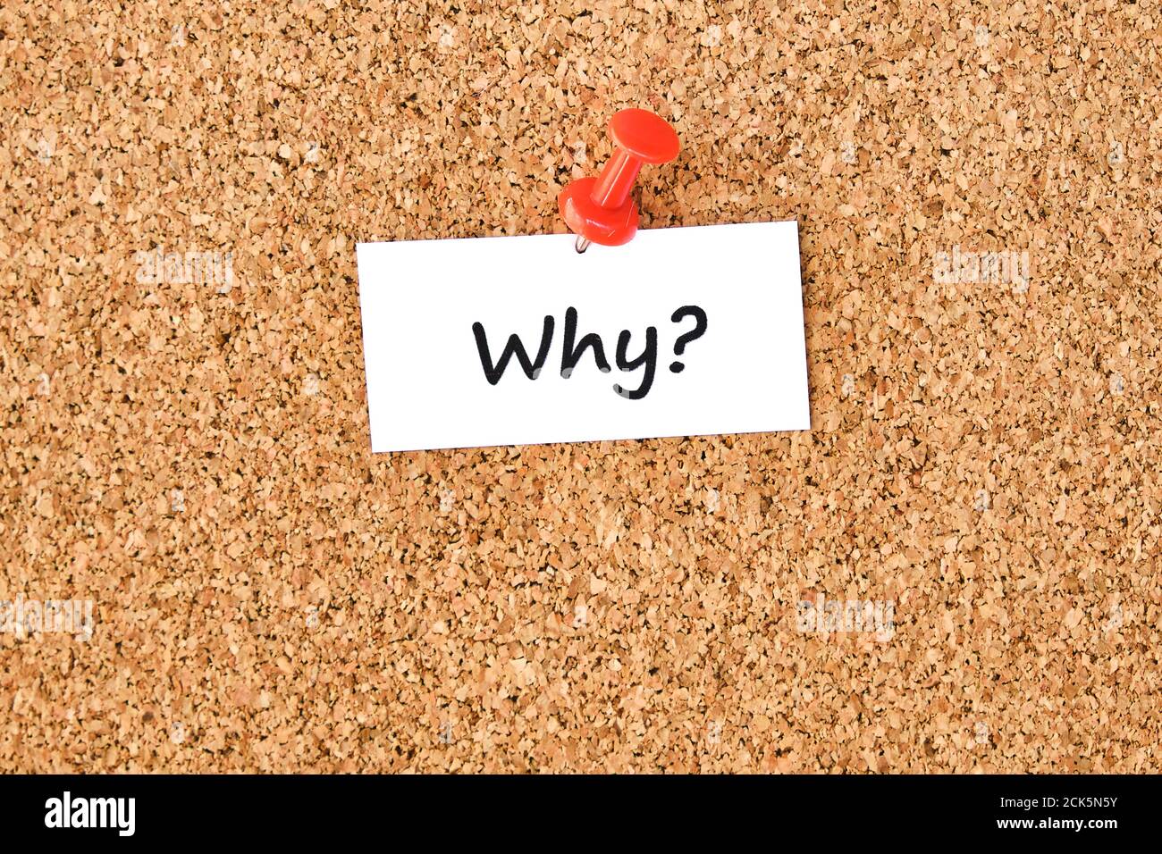 Why Word written on a piece of paper or note, cork board background ...