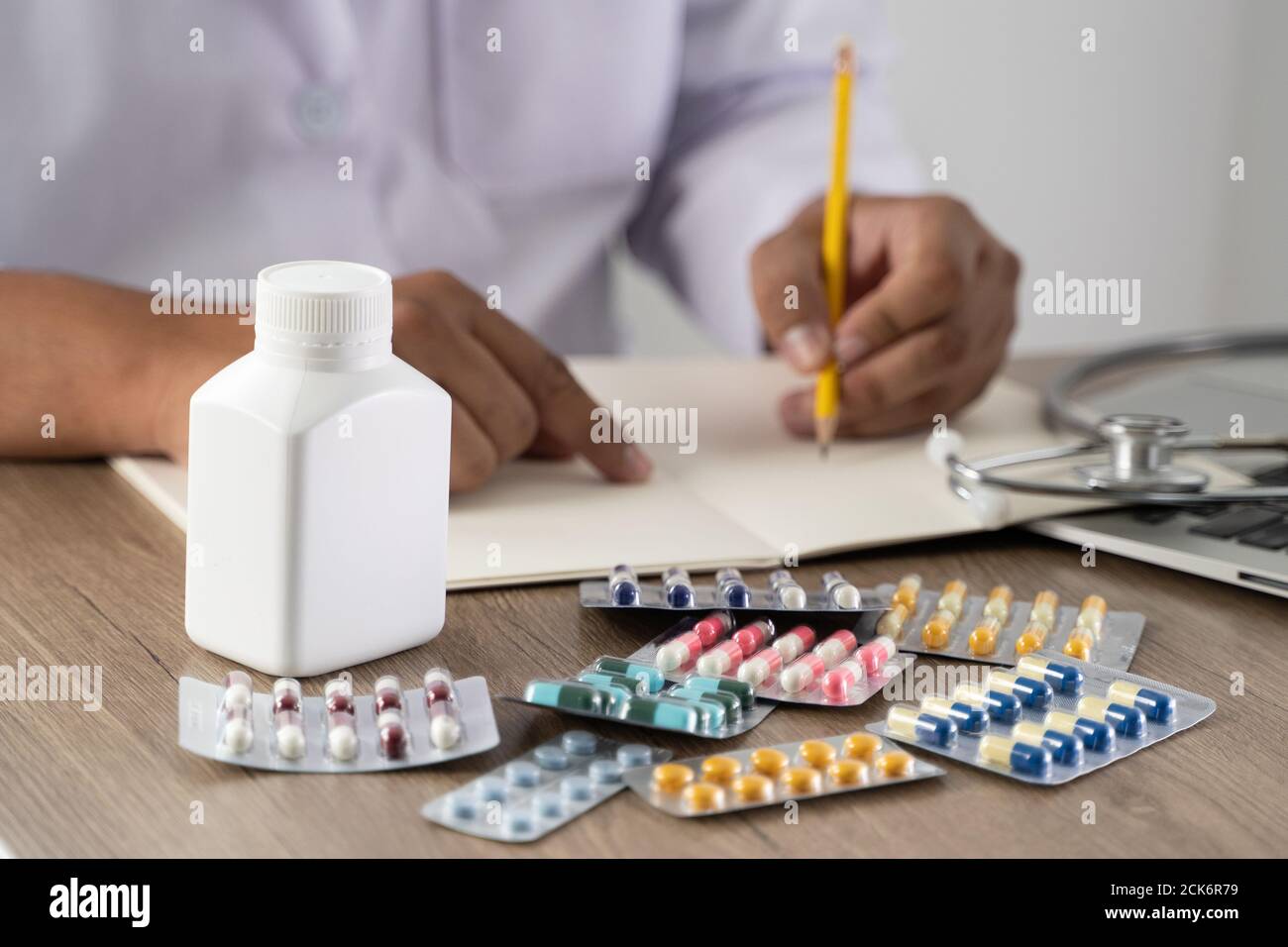 medical doctor writing prescription physician with stethoscope ...