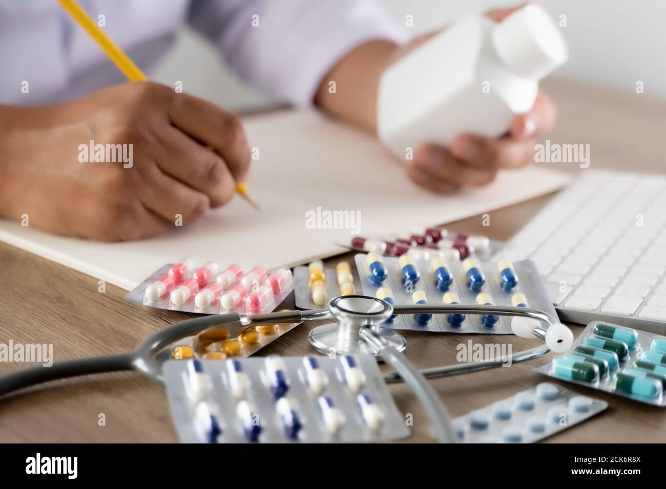 medical doctor writing prescription physician with stethoscope ...