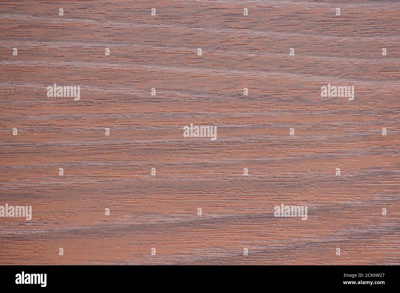 Mahogany, the texture of a natural dark wood with a rich pattern close ...