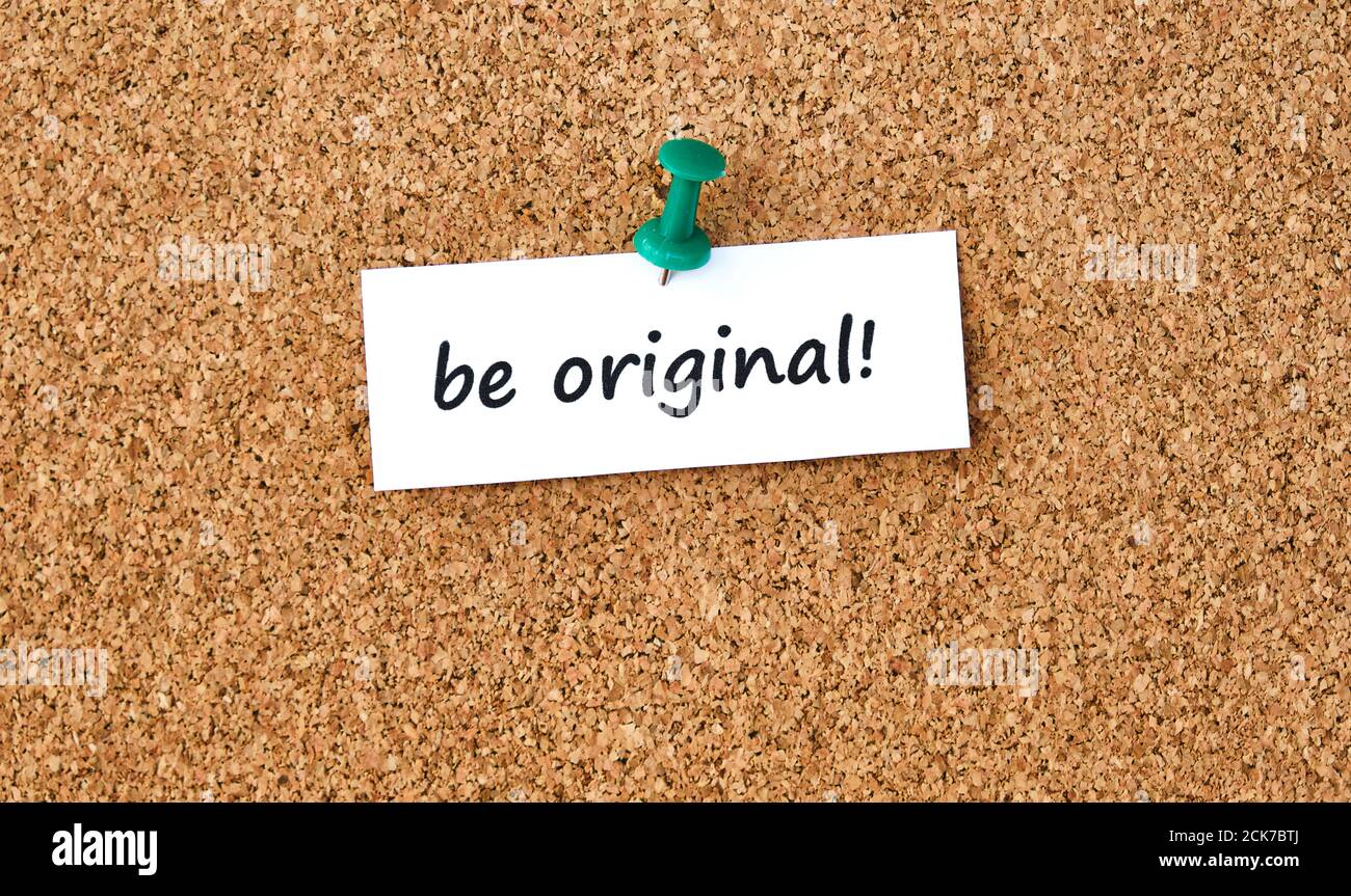 Be original. Text written on a piece of paper or note, cork board ...