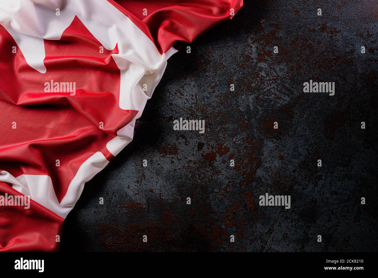 National flag of Canada on dark stone background, beautiful colored ...