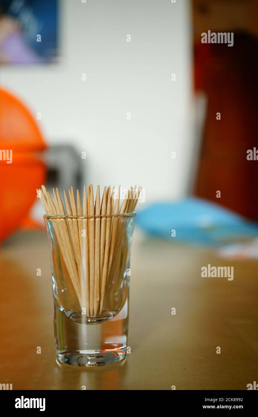 Closeup shot of wooden toothpicks in a glass Stock Photo - Alamy