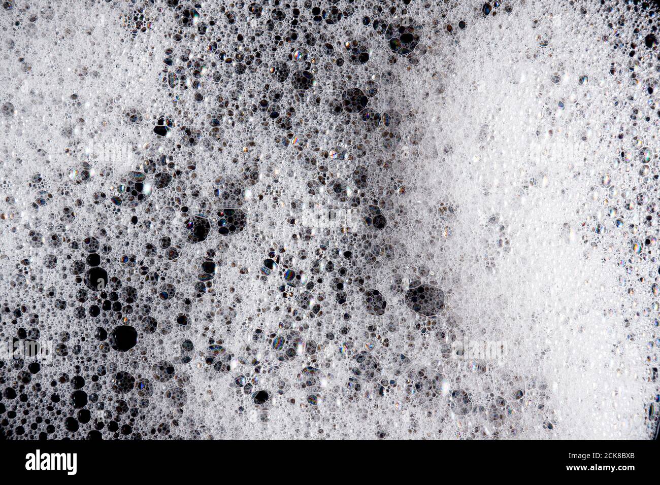 Abstract background white soapy foam texture. Shampoo foam with bubbles ...