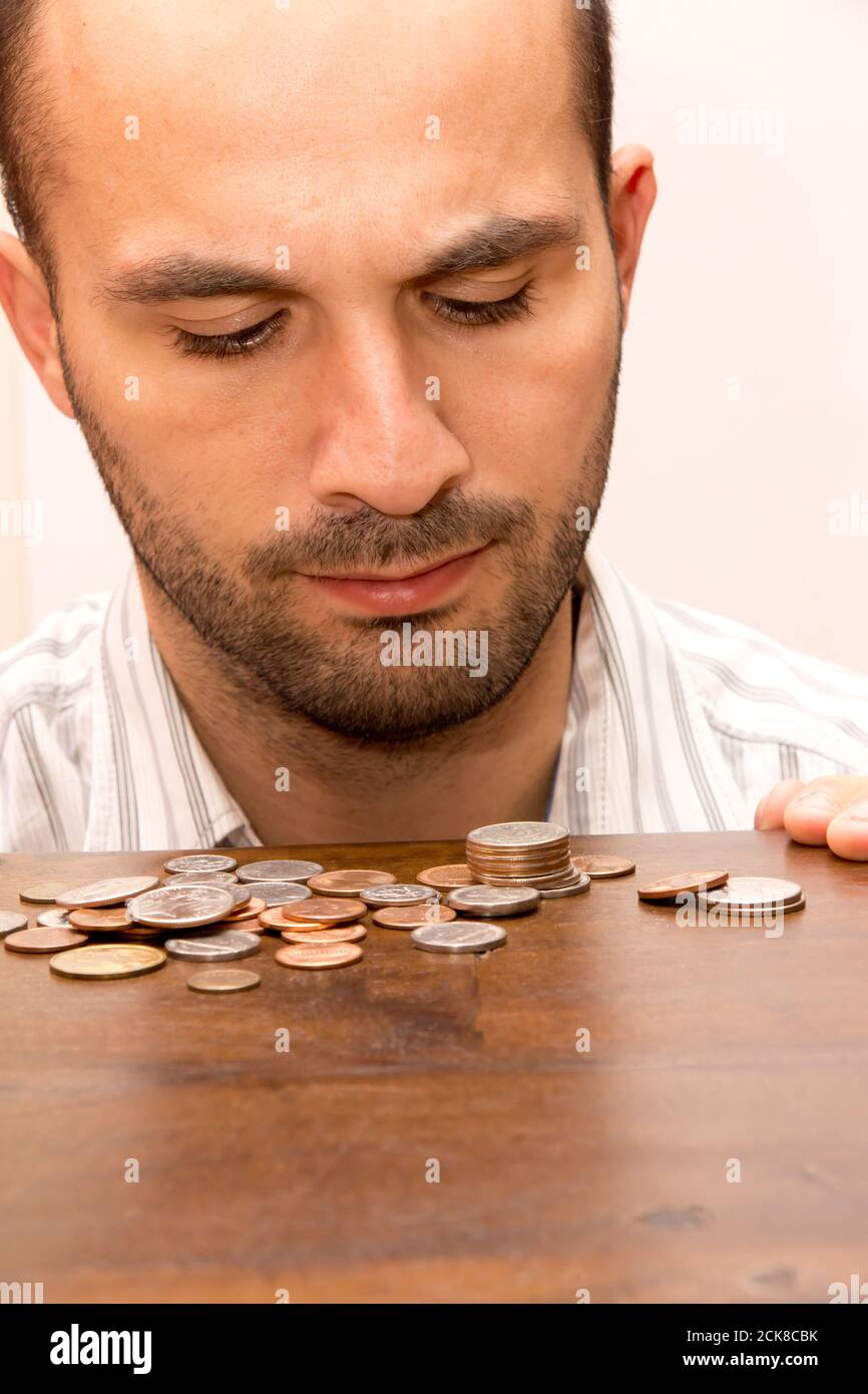Old person counting coins hi-res stock photography and images - Alamy