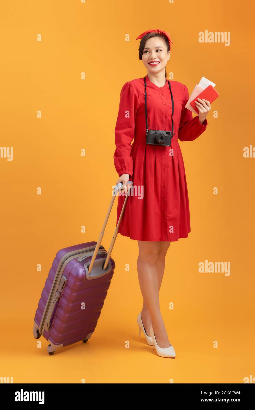 Pulling luggage bag hi-res stock photography and images - Alamy