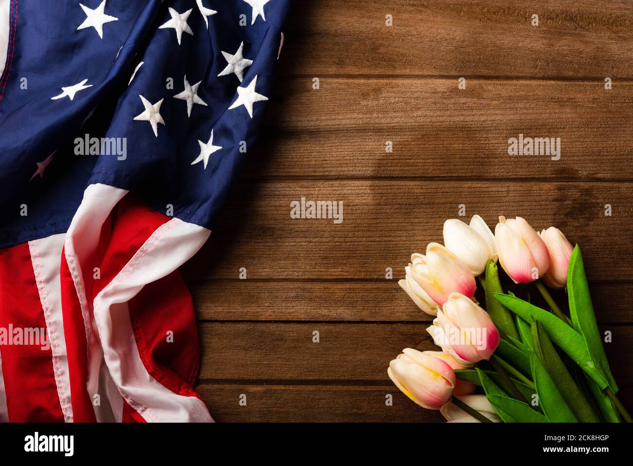 America United States flag and tulip flower, memorial remembrance and ...