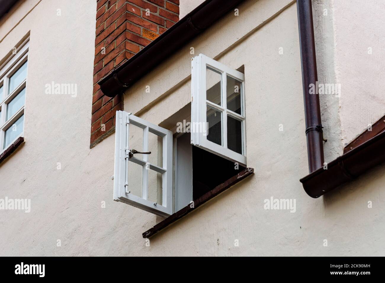 Low angle shot of a white wooden window Stock Photo - Alamy