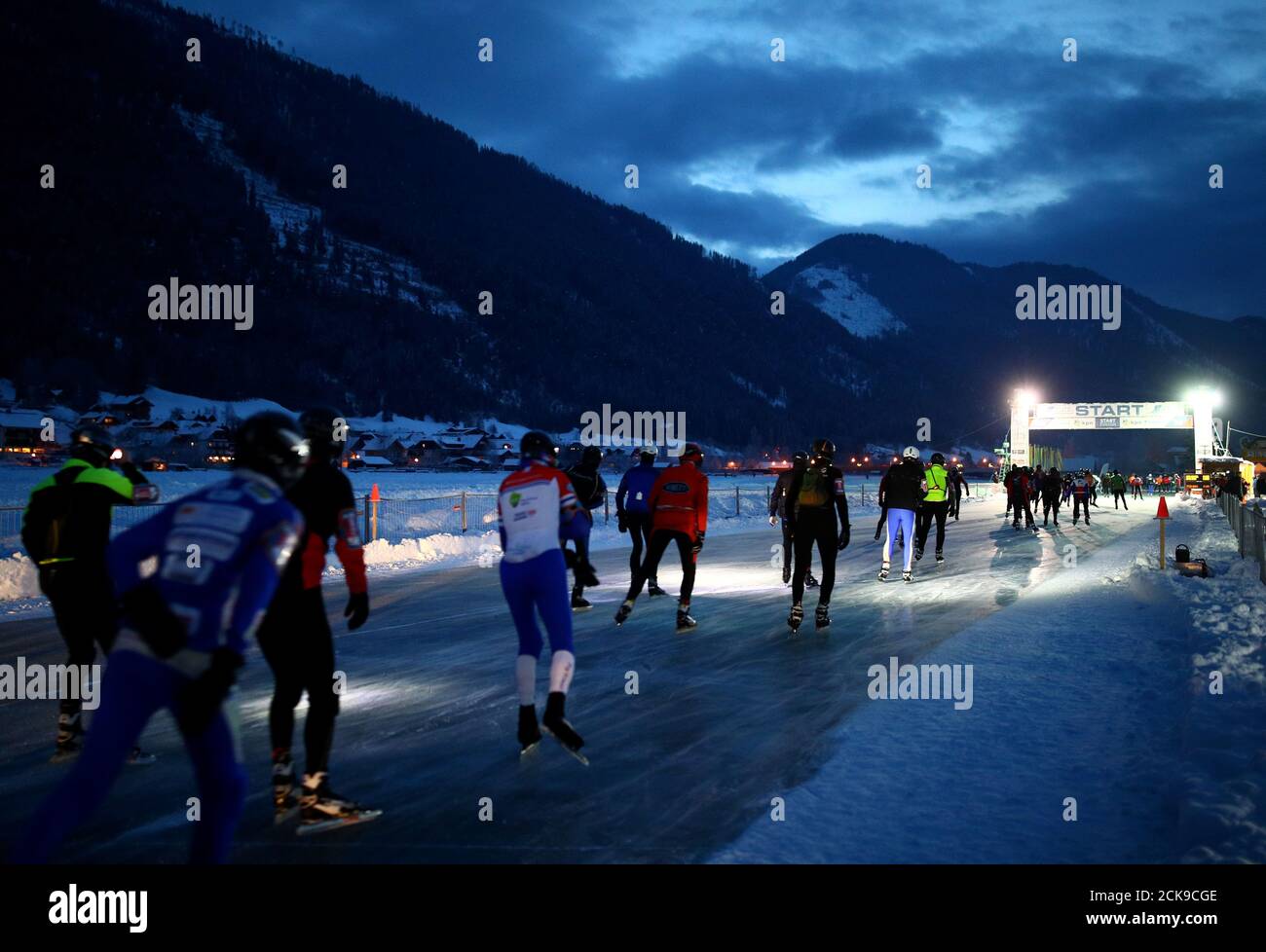 Ice skating on lake lake weissensee hi-res stock photography and images ...